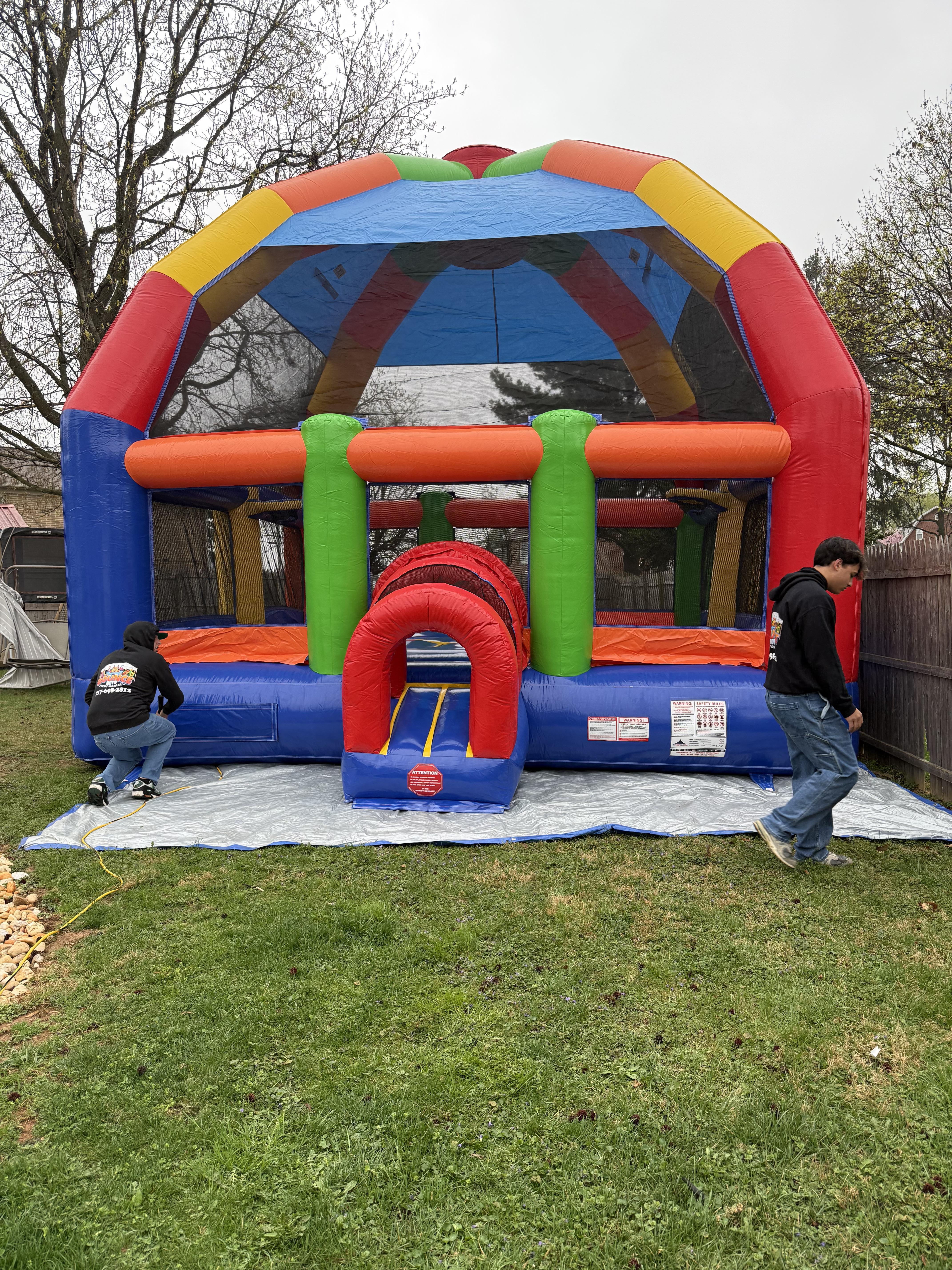 Big Bubba Giant Rainbow Bounce House | Bounce Boys Rentals